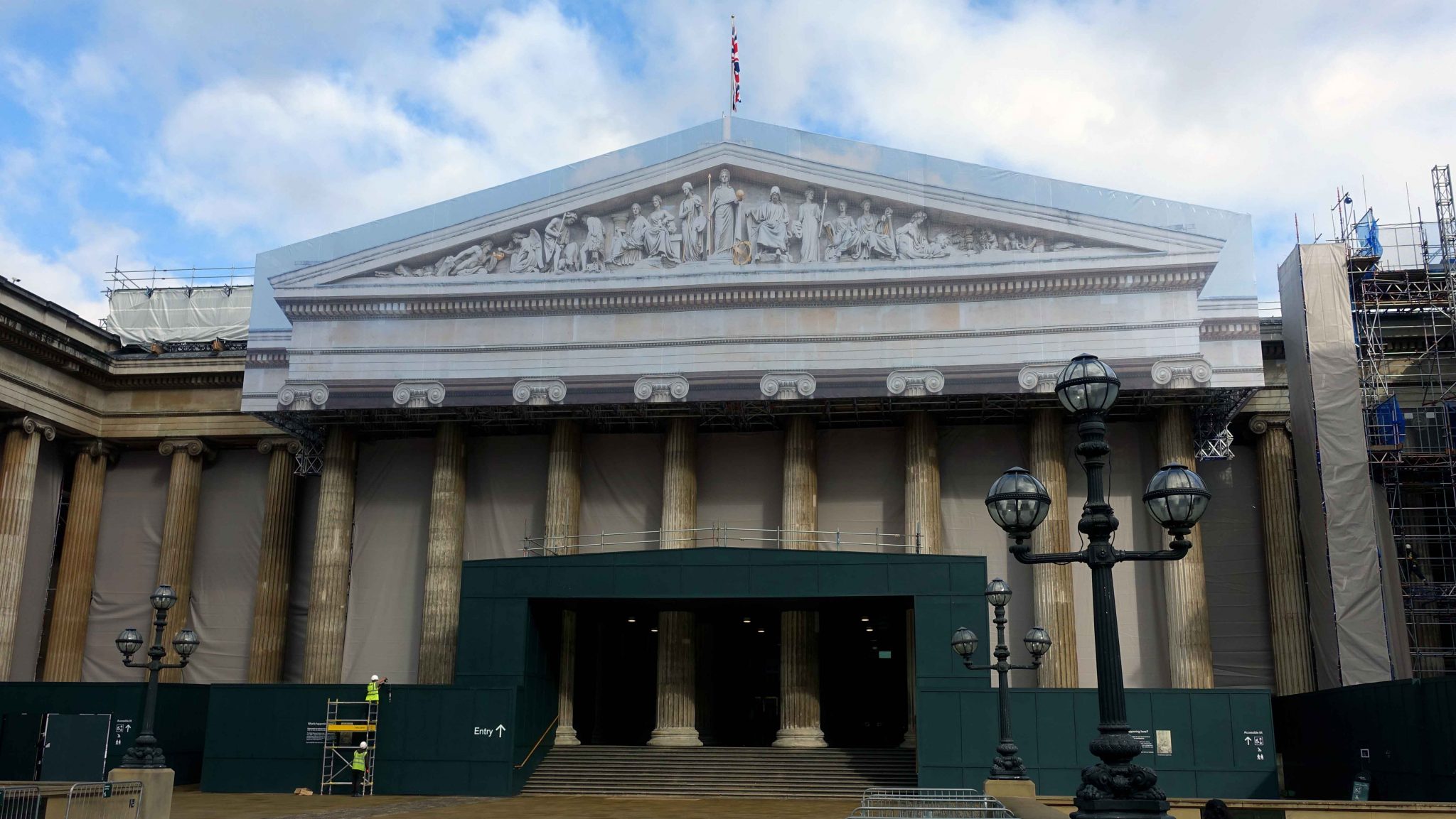 Artistic building wrap effectively hides the scaffolding for British Museum